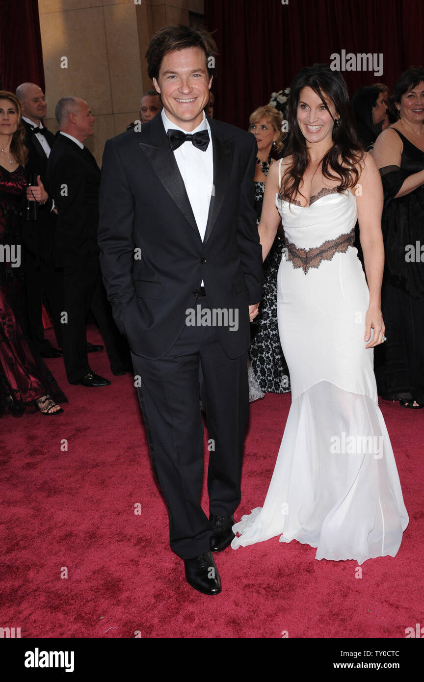 Jason Bateman (L) and his wife Amanda Anka arrive for the 80th Annual ...