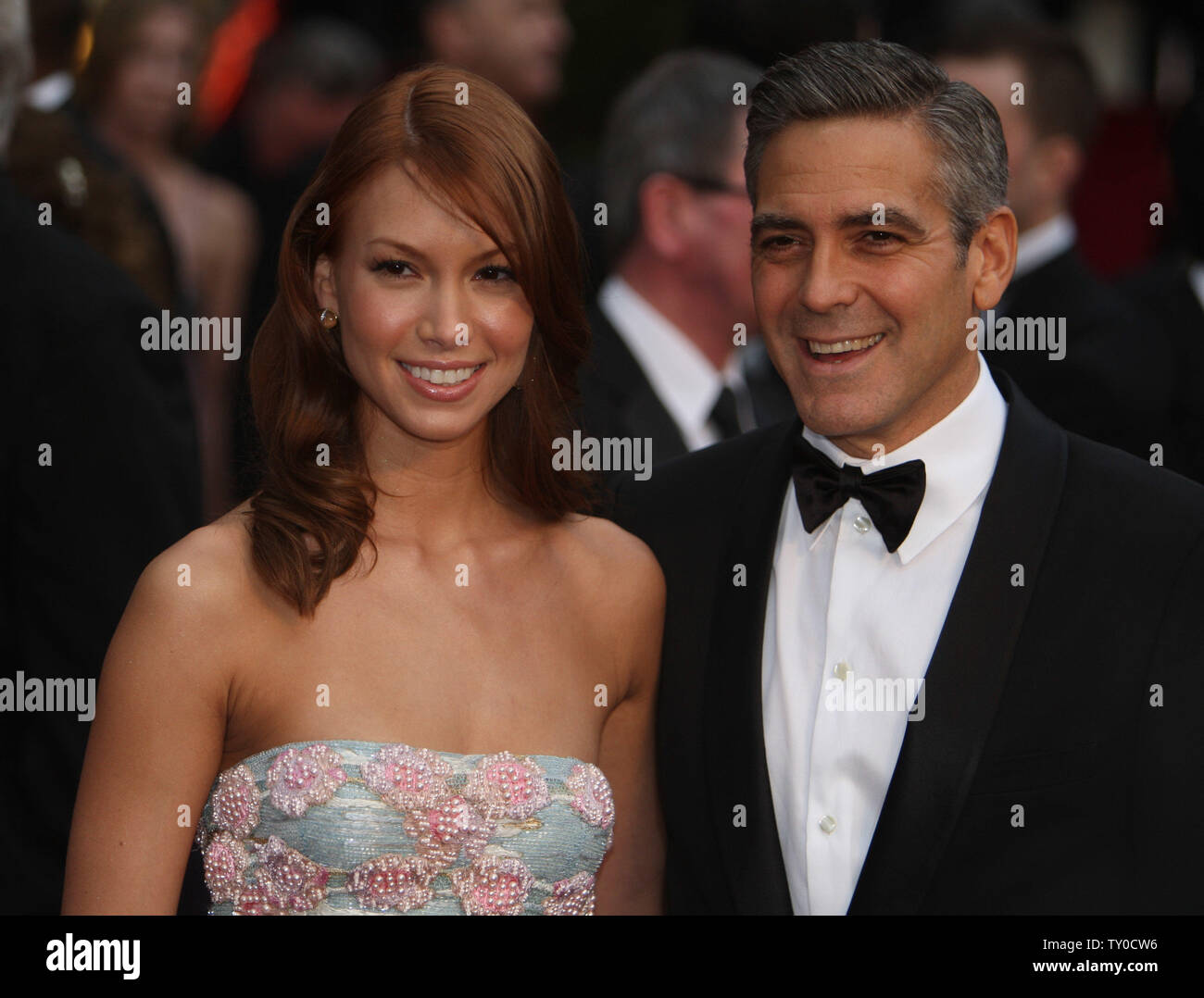 George Clooney (R) and Sarah Larson arrive for the 80th Annual Academy ...