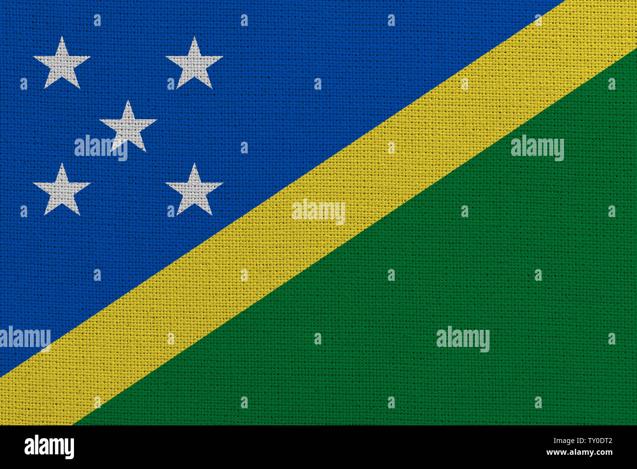 Solomon Islands fabric flag. Patriotic background. National flag of ...