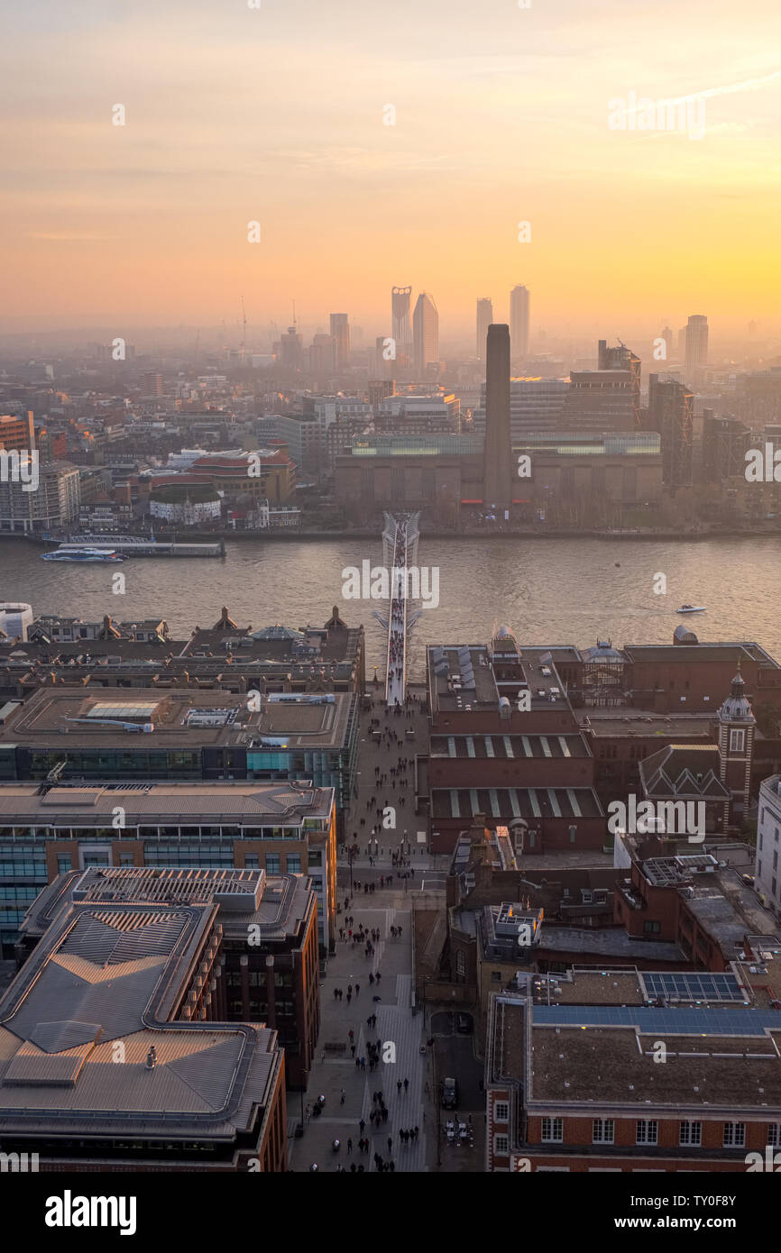 Aerial view of Millennium Bridge in London at the sunset, United ...
