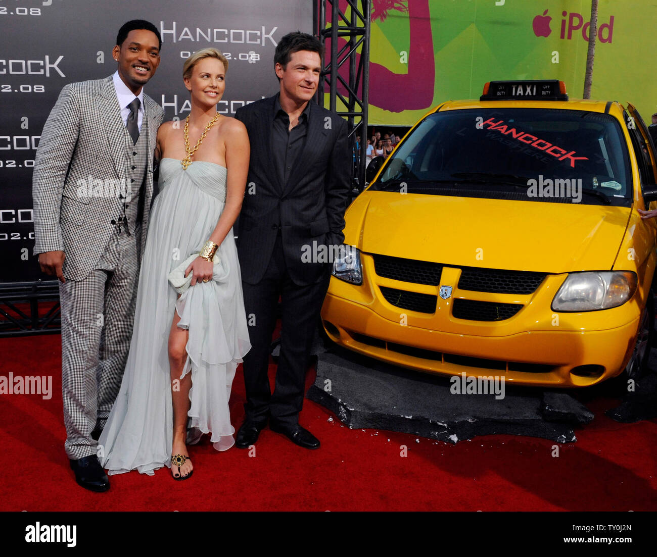 Will Smith, Charlize Theron and Jason Bateman (L-R), cast members in ...