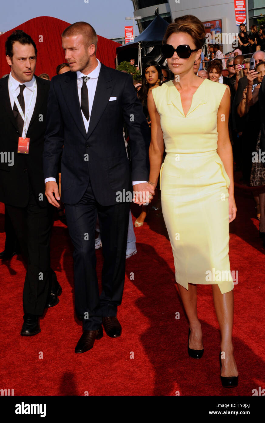 Soccer player David Beckham and his wife Victoria arrive for the ESPY ...
