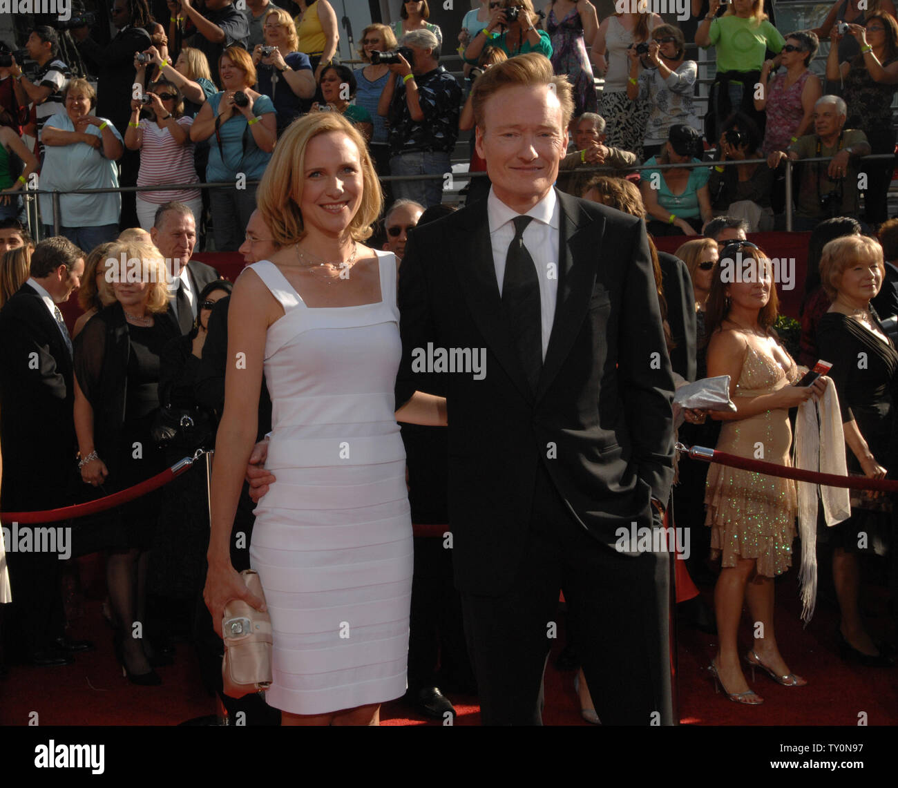 Conan O'Brien and his wife, Liza Powel, arrive at the 60th Primetime ...