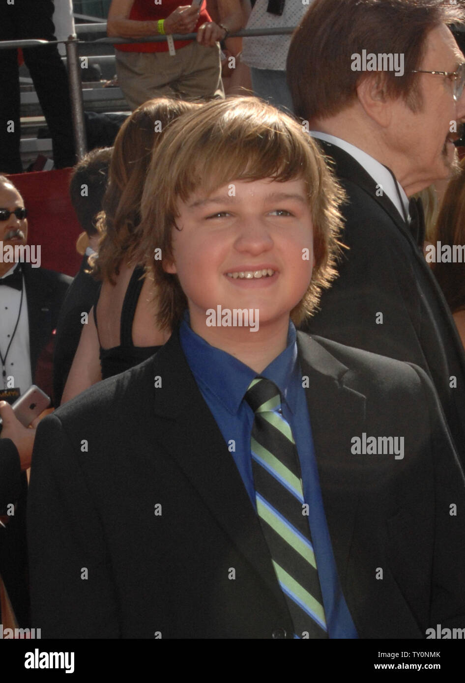 Angus T. Jones arrives at the 60th Primetime Emmy Awards at the Nokia ...