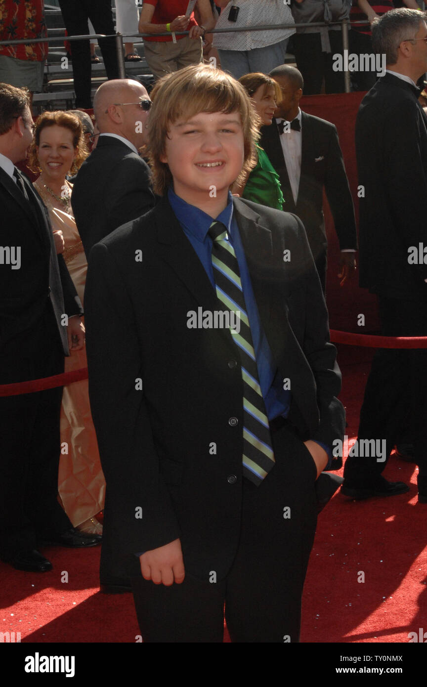 Angus T. Jones arrives at the 60th Primetime Emmy Awards at the Nokia ...