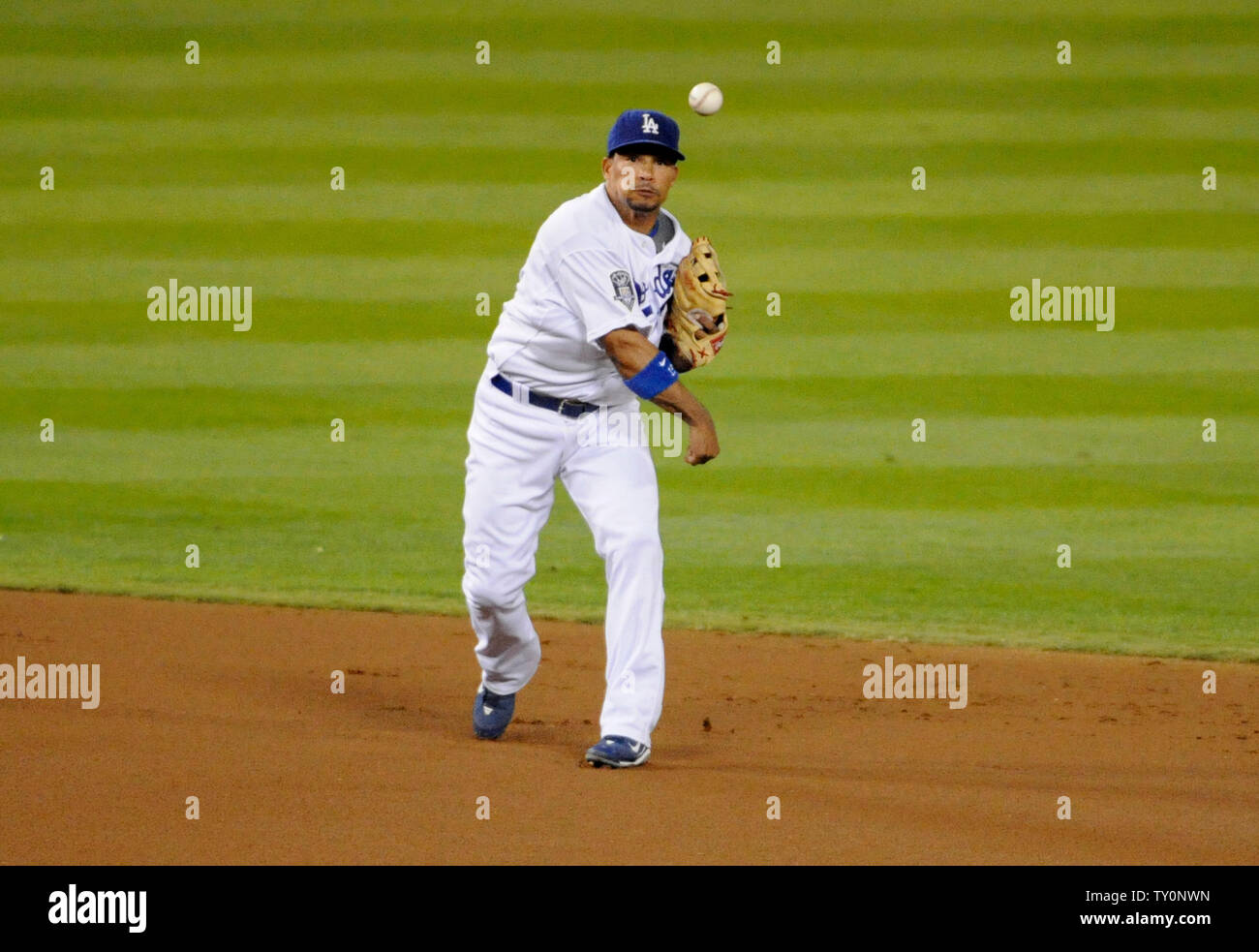 Los Angeles Dodgers' Rafael Furcal makes the throw to first base for an ...