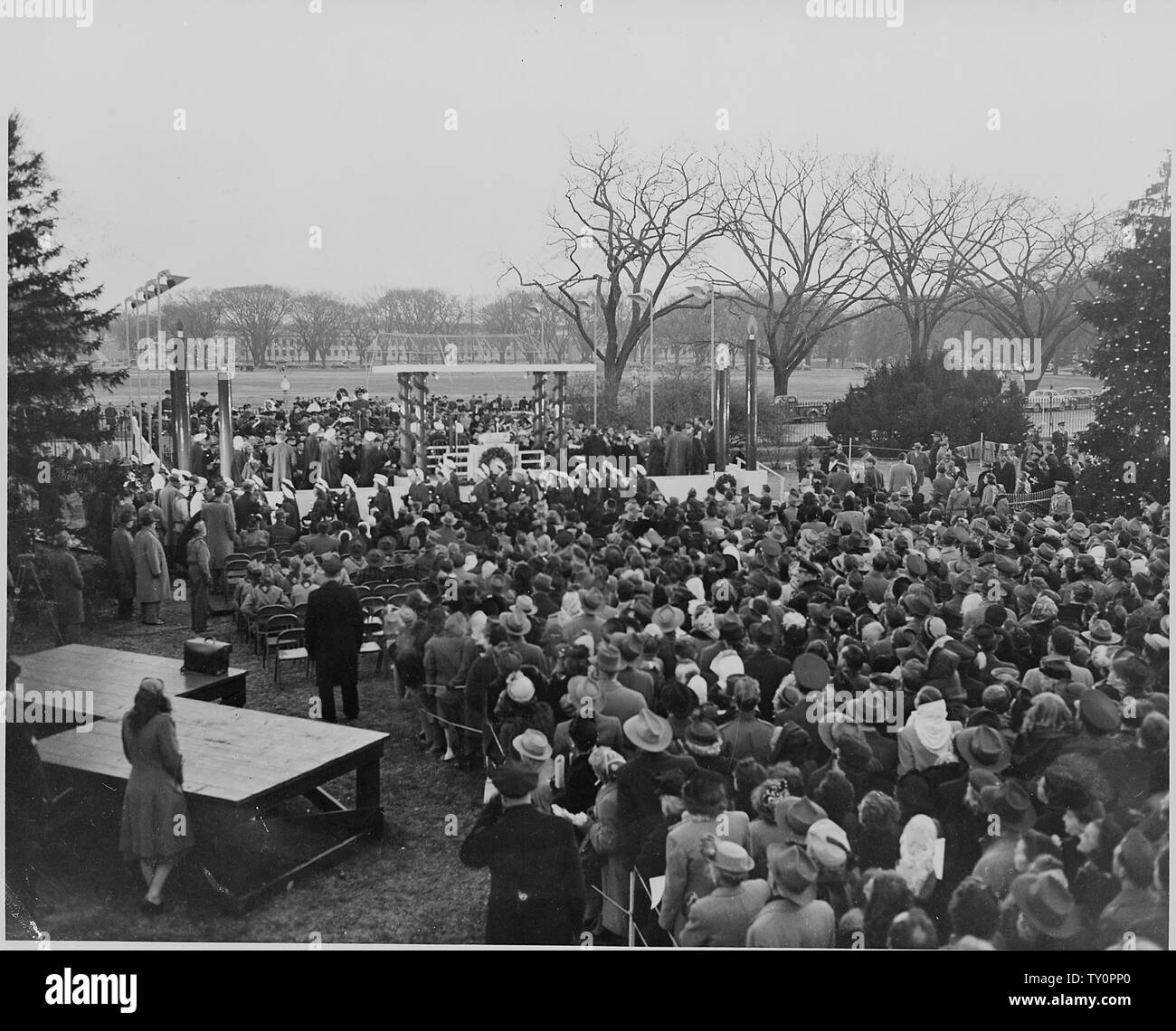 Distance view of audience looking toward podium at the ceremonies for ...