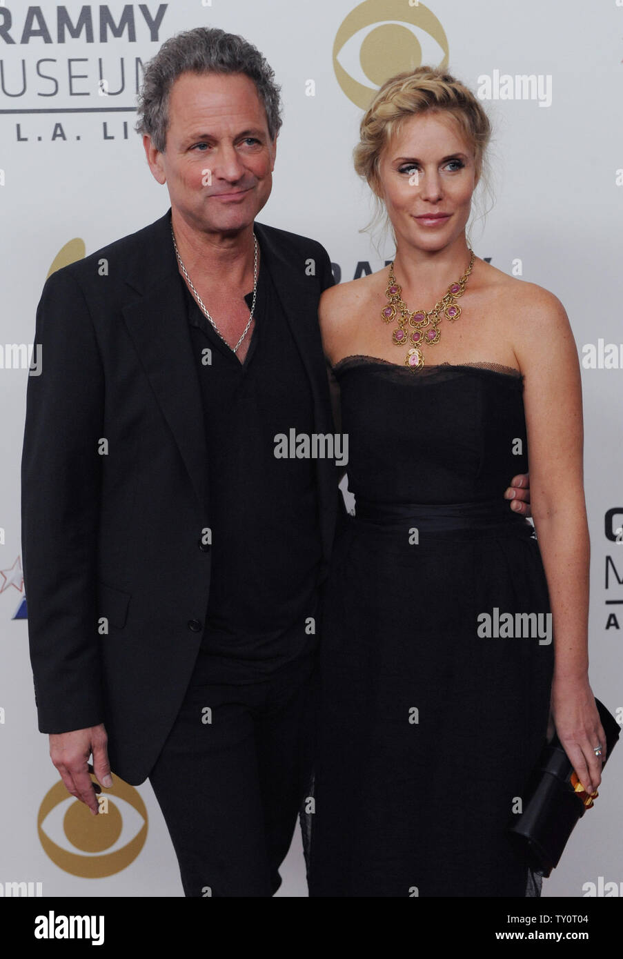 Musician Lindsey Buckingham and his wife Kristen arrive at "The Grammy ...