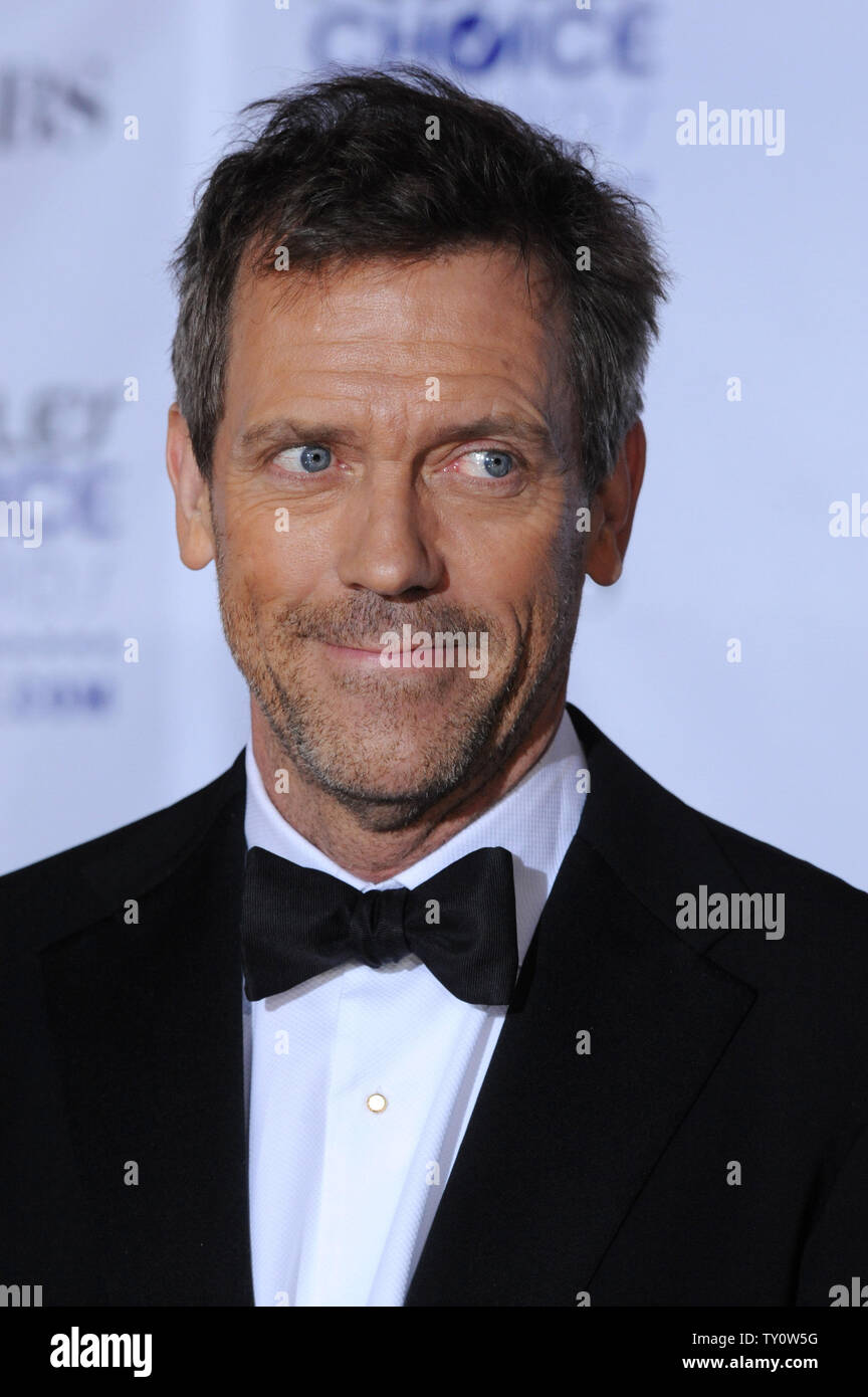 Actor Hugh Laurie arrives at the 35th annual People's Choice Awards in ...