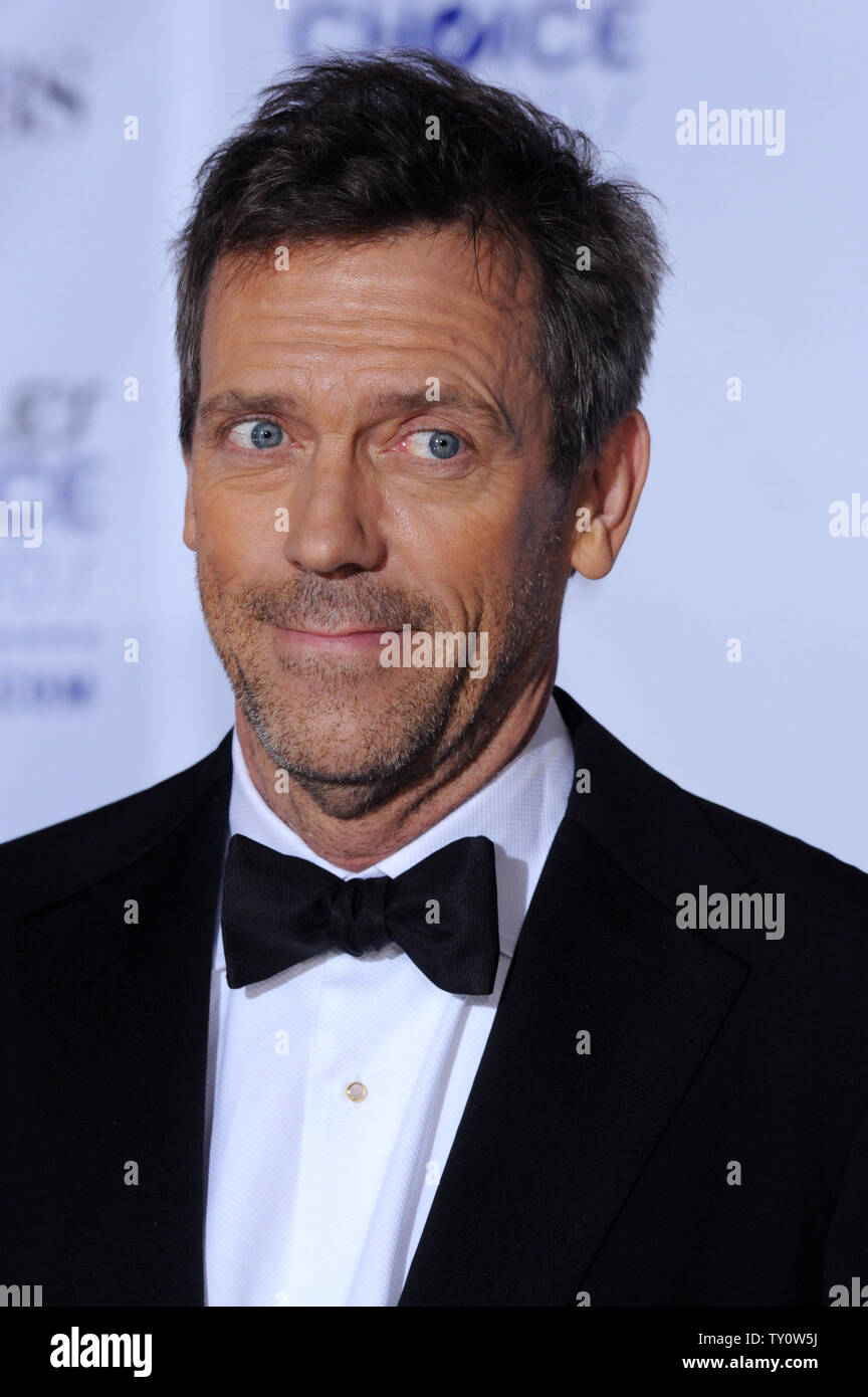 Actor Hugh Laurie arrives at the 35th annual People's Choice Awards in ...