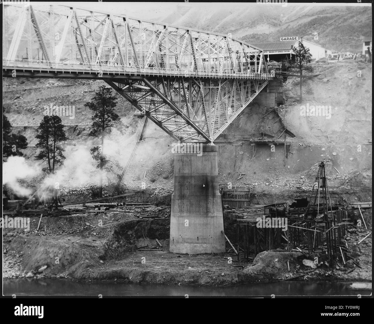 Driving wood piling for working platform in enlarging highway bridge ...