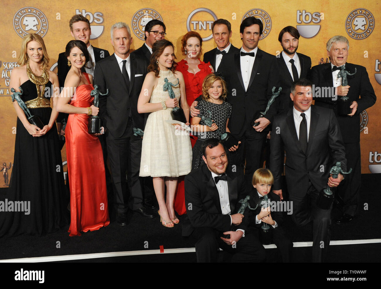 The cast of "Mad Men" appear backstage with the award for outstanding ...