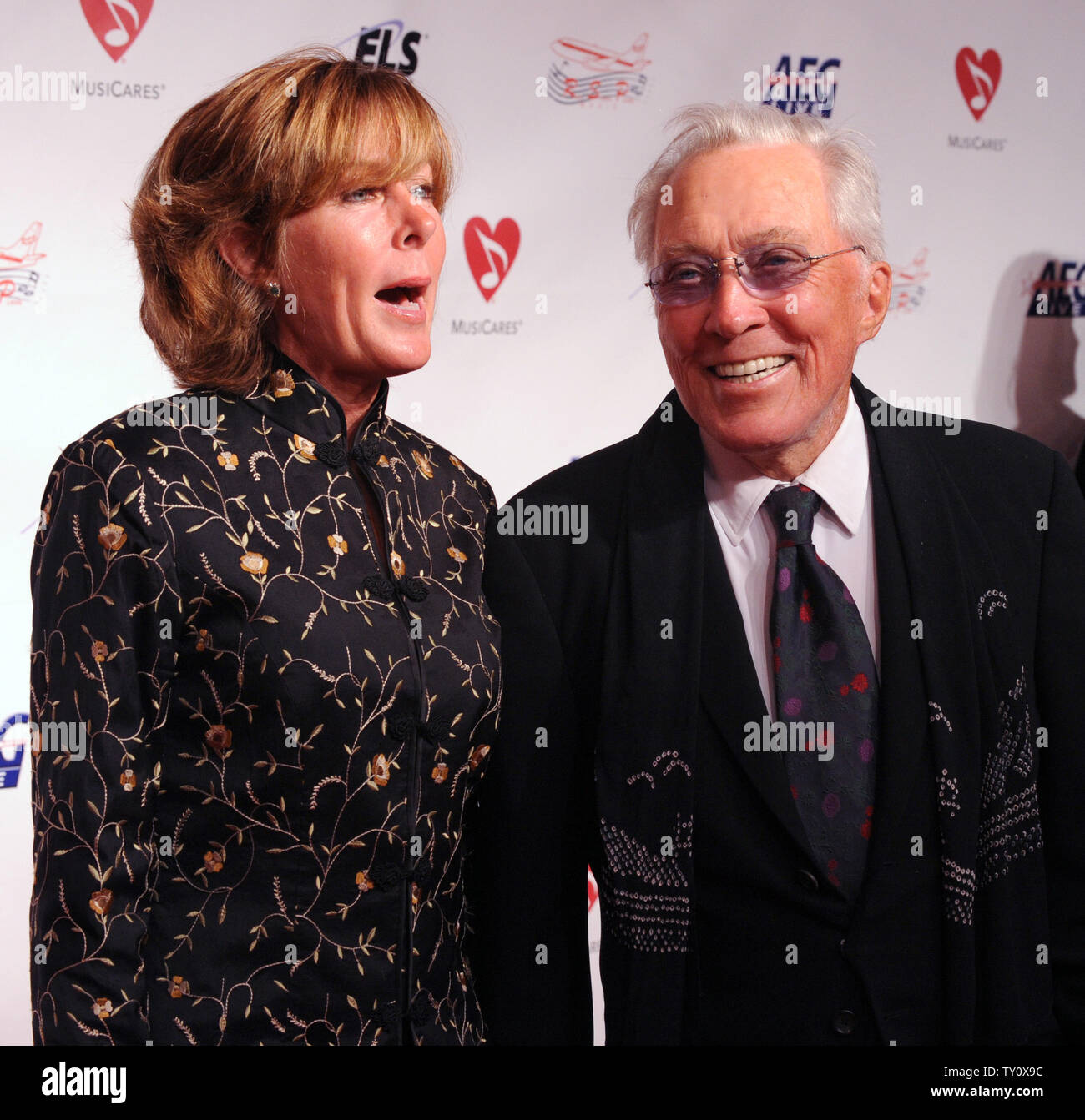 Singer Andy Williams and his wife Debbie Haas arrive at the MusiCares ...