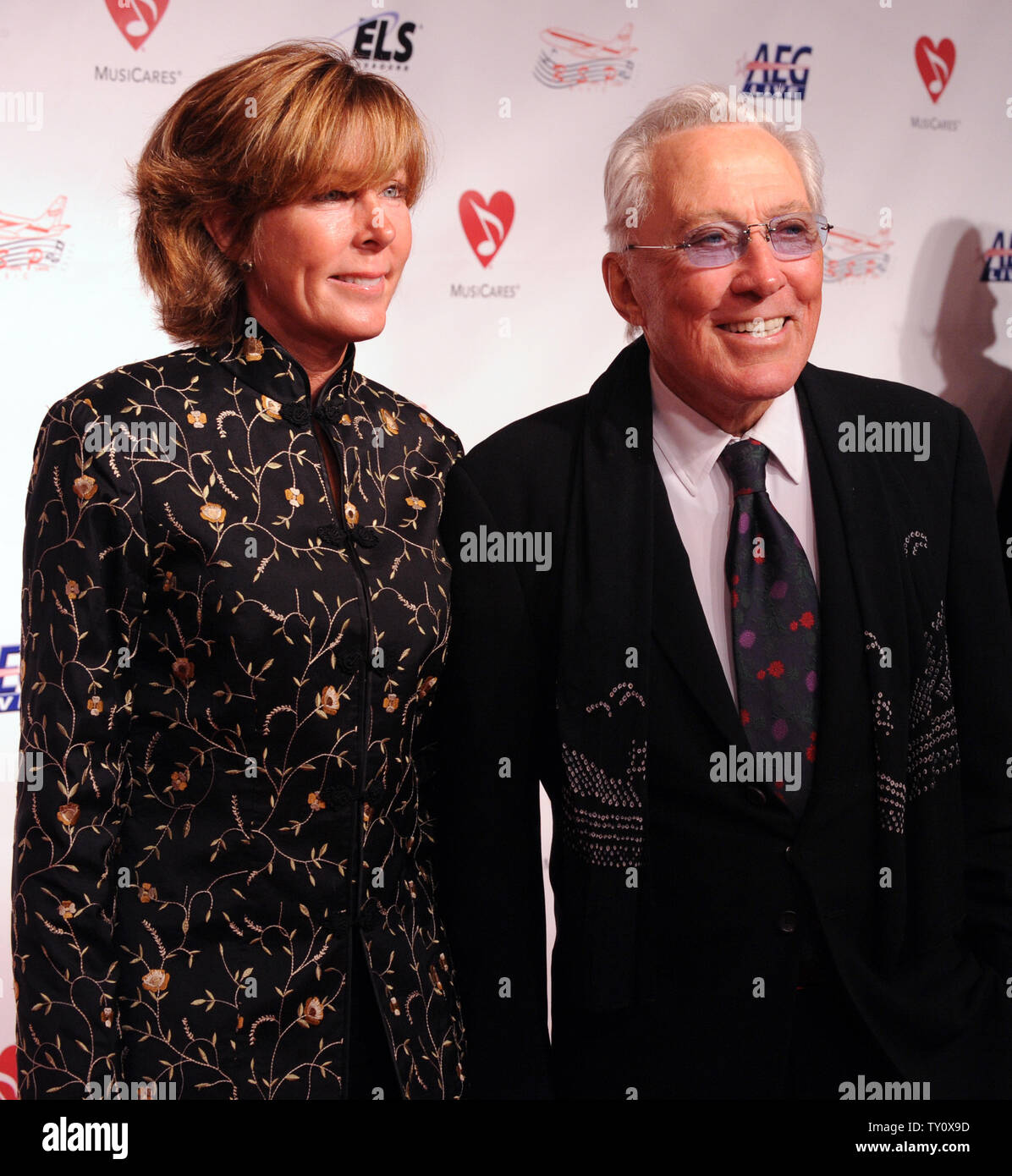 Singer Andy Williams and his wife Debbie Haas arrive at the MusiCares ...