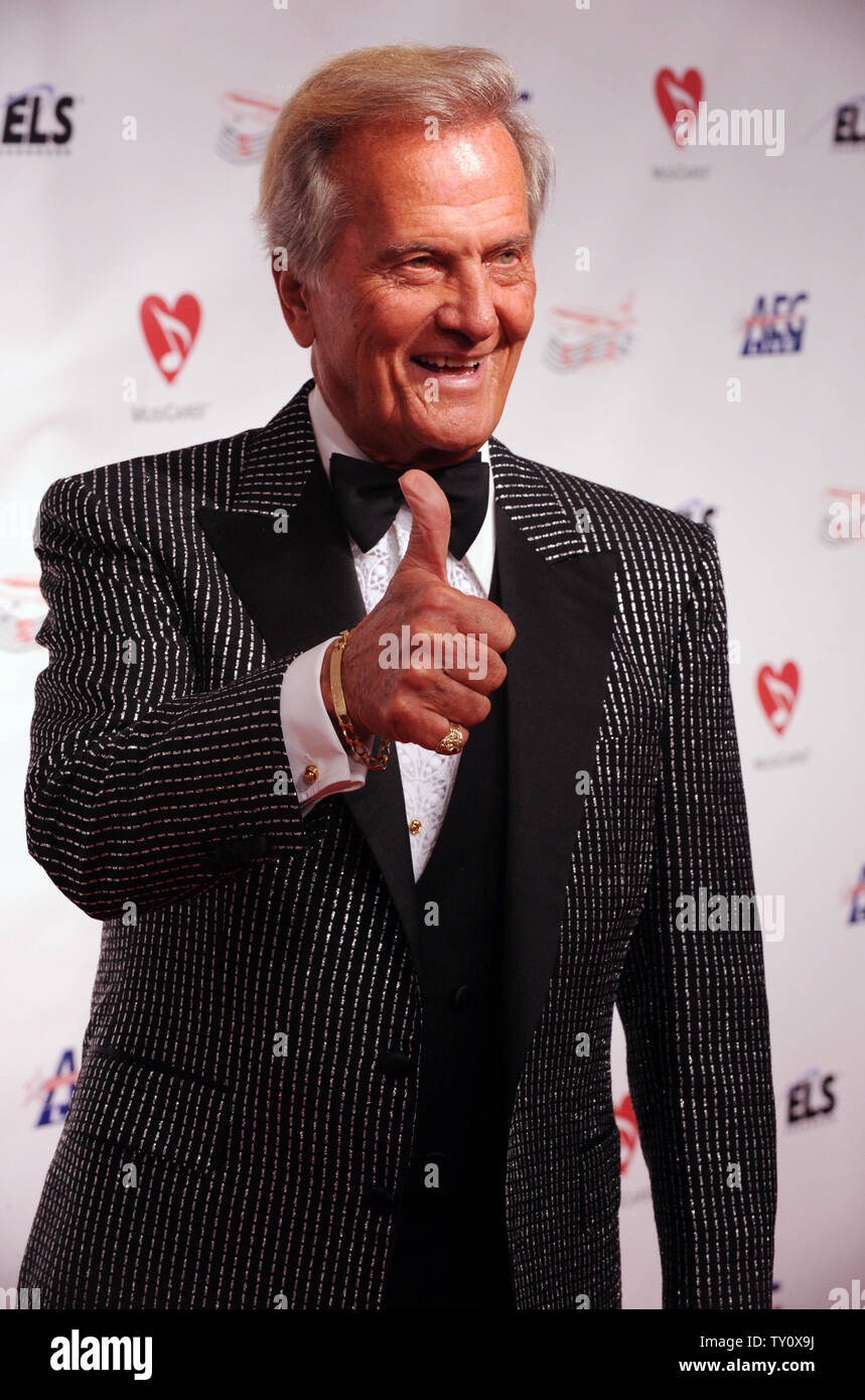 Singer Pat Boone arrives at the MusiCares Person of the Year tribute ...