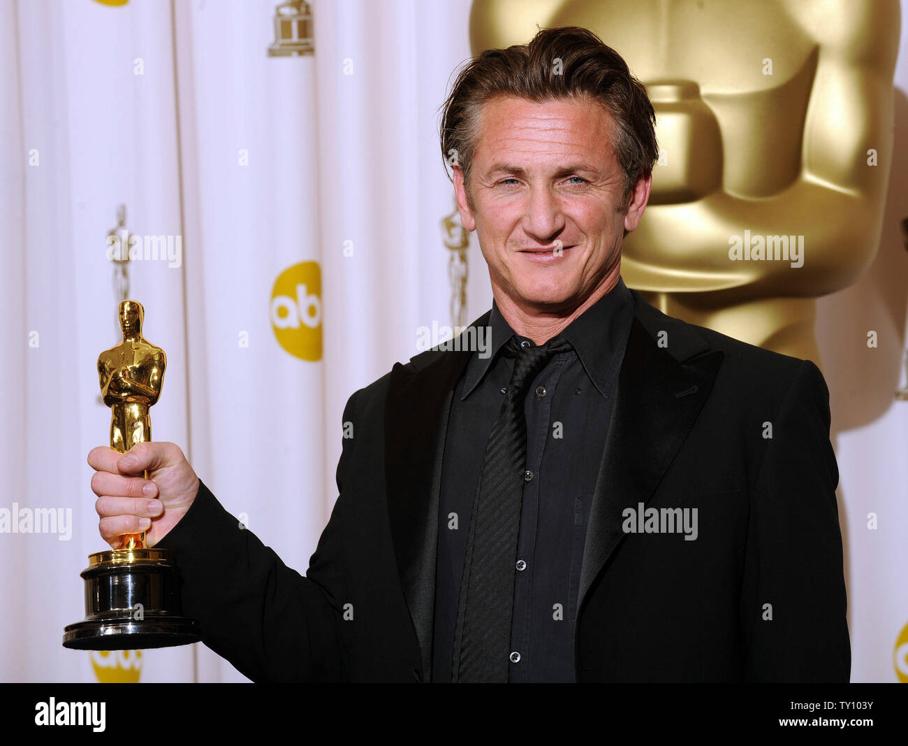 Sean Penn holds his Oscar for best actor for the film "Milk" backstage ...