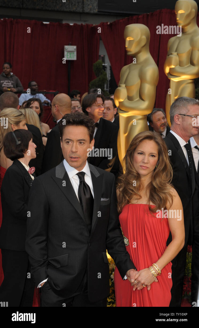Actor Robert Downey Jr. (L) and Susan Downey arrive at the 81st Academy Awards in Hollywood on ...