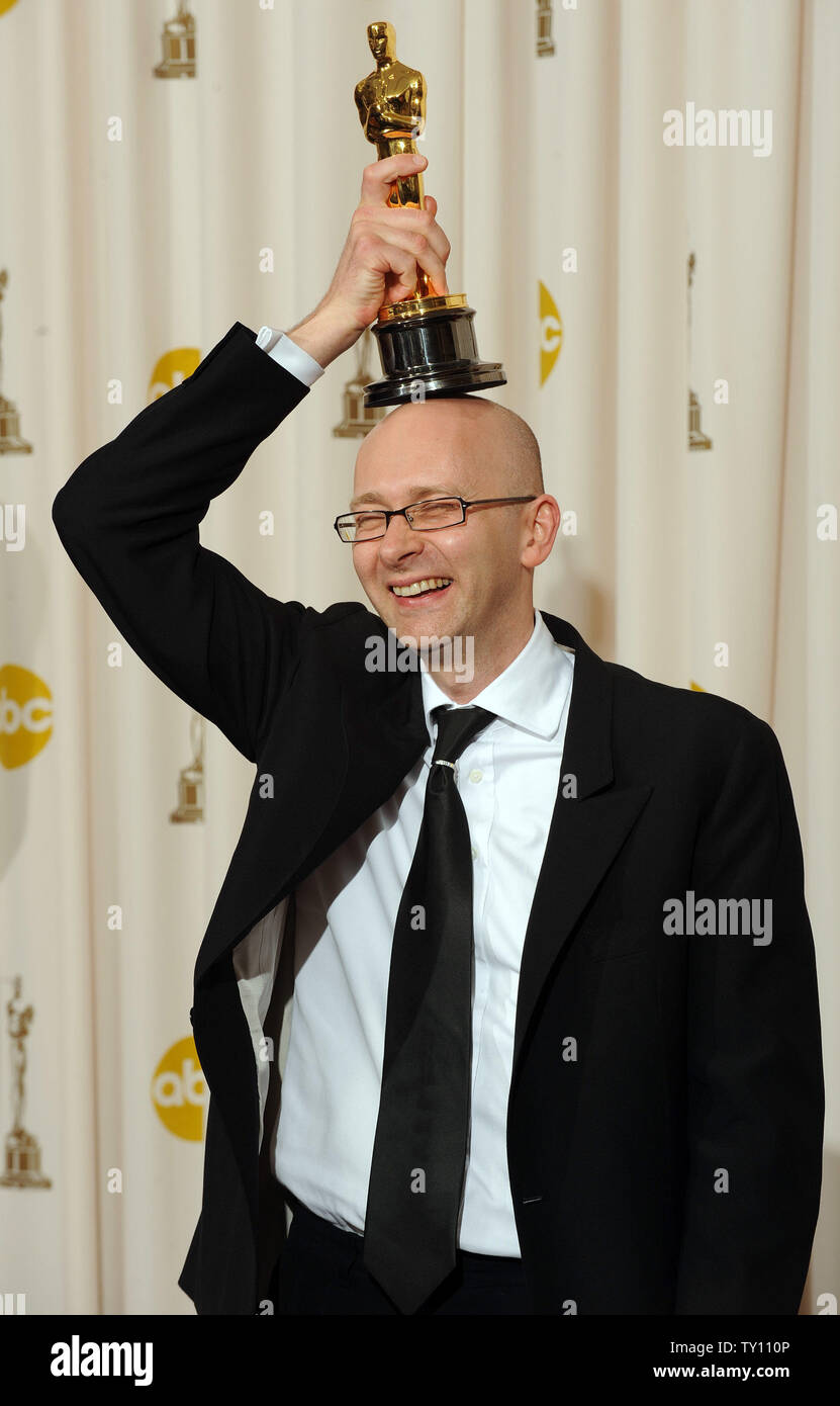 Chris Dickens holds his Oscar for film editing "Slumdog Millionaire" at the 81st Academy Awards ...