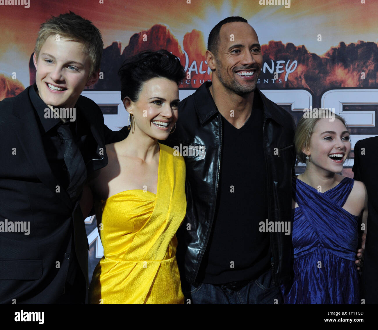 Cast members Alexander Ludwig, Carla Gugino, Dwayne Johnson and ...