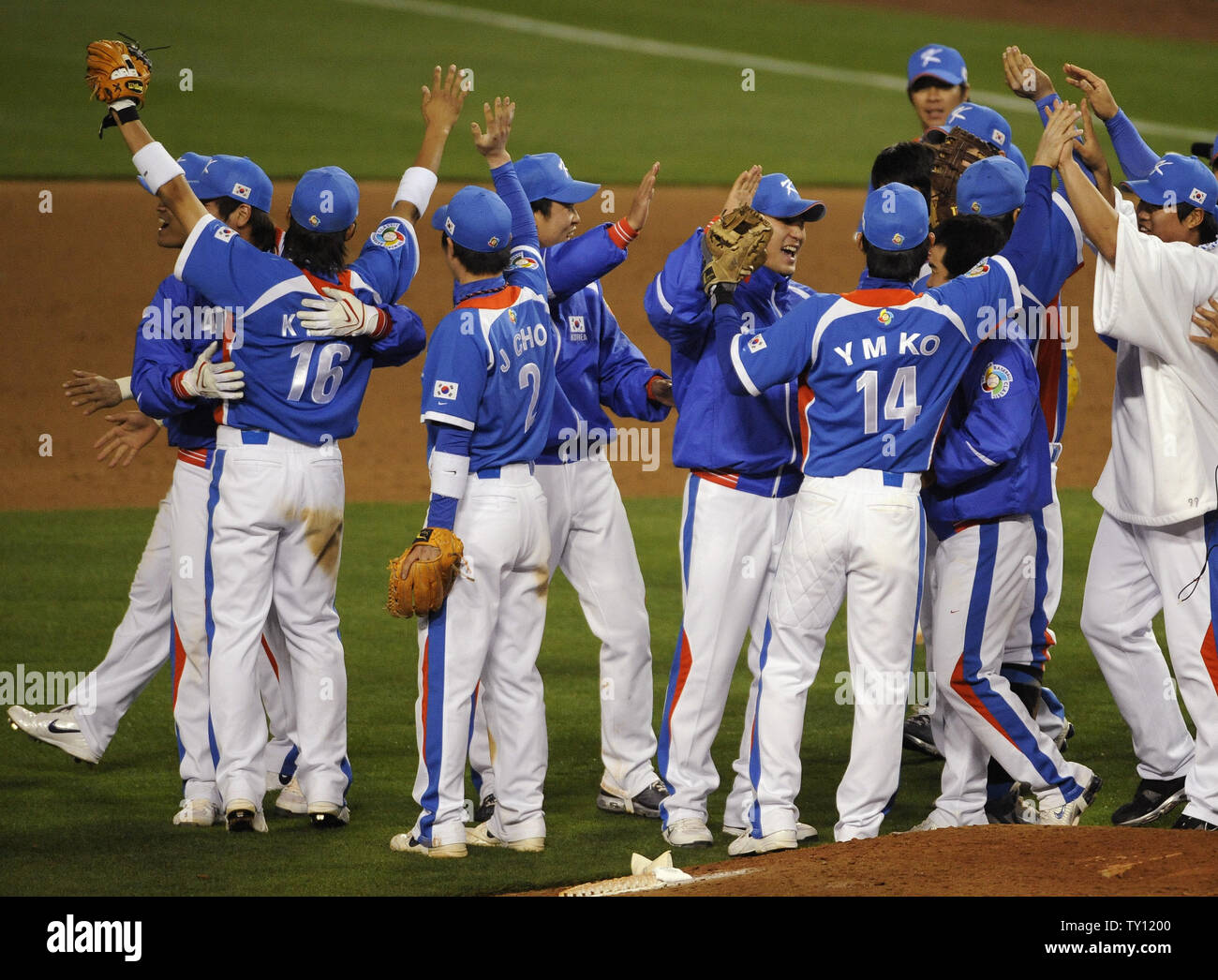 Korea celebrates it's 10-2 victory over Venezuela after their World ...
