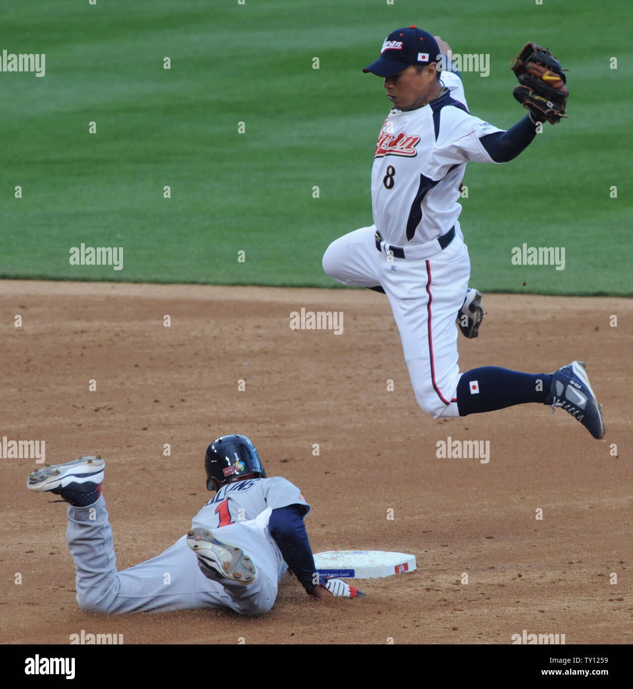 United States' Jimmy Rollins (1) steals second as Japan's Akinori ...