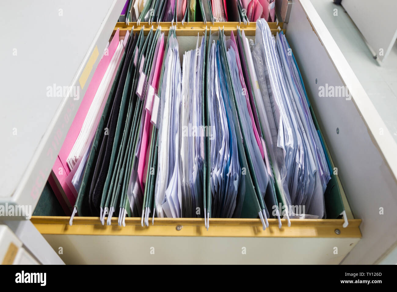 Files document of hanging file folders in a drawer in a whole pile of ...