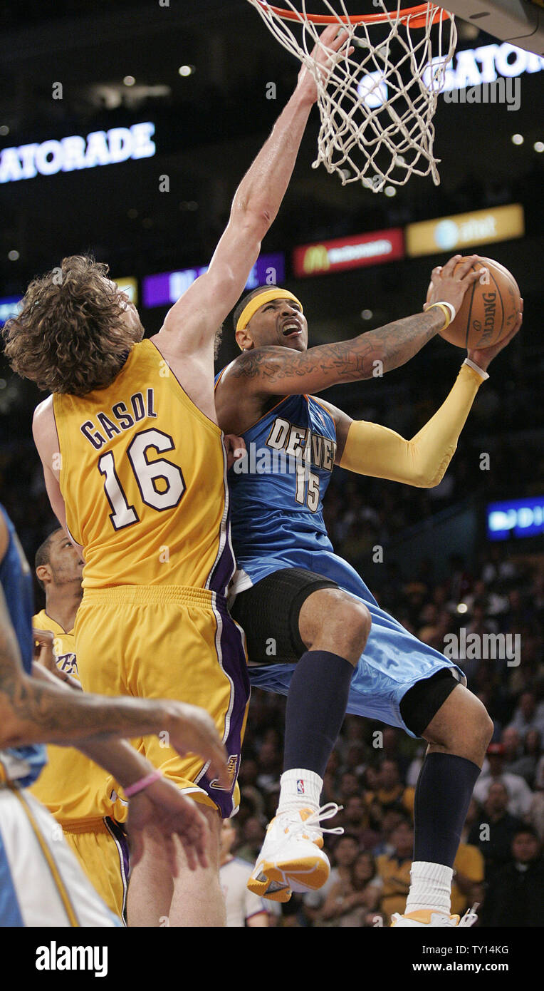 Los Angeles Lakers center Pau Gasol blocks the shot of Denver Nuggets ...