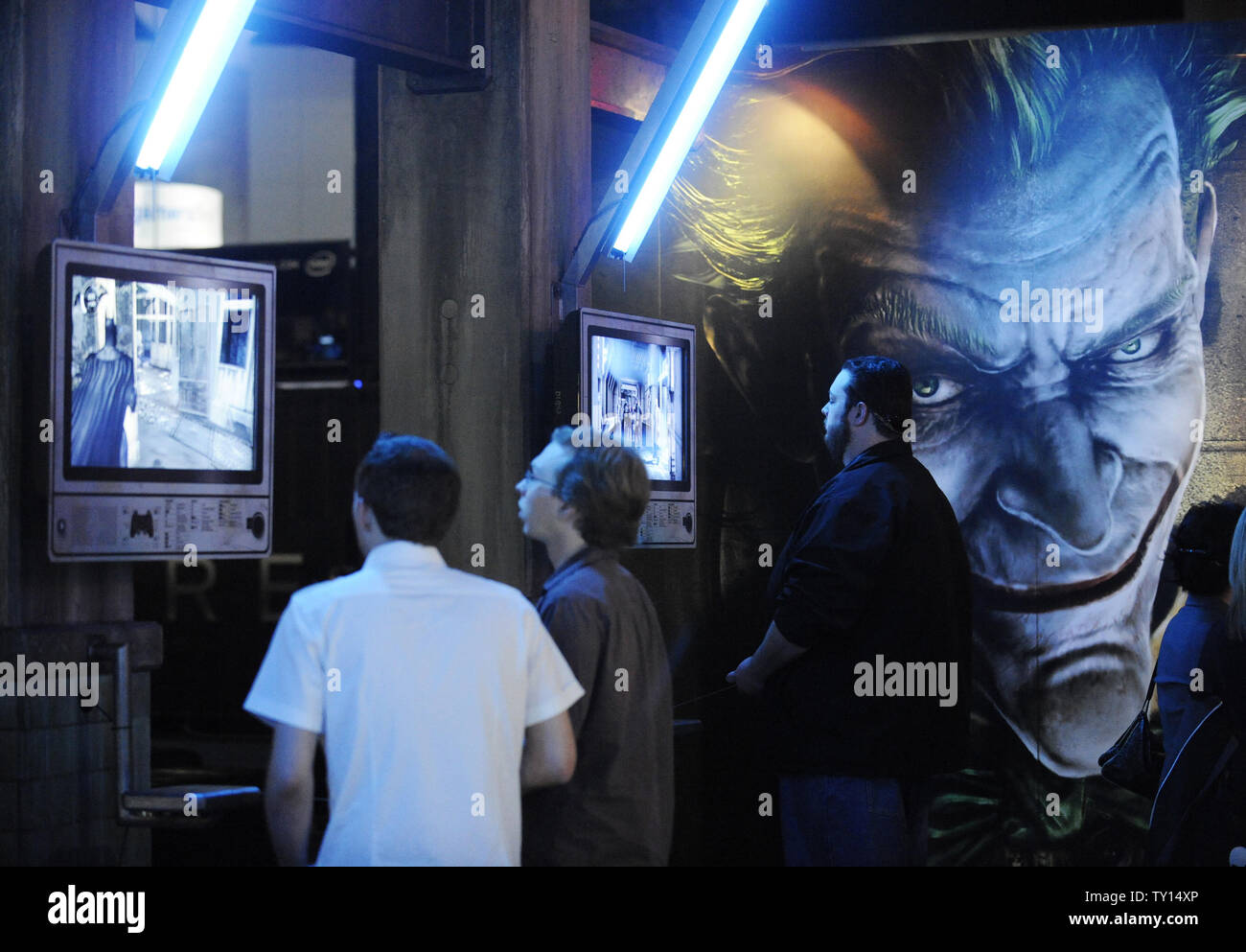 Attendees Play Batman Arkham Asylum During The E3 Electronic