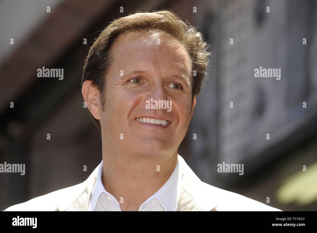 Producer Mark Burnett attends a ceremony where he receives a star on ...
