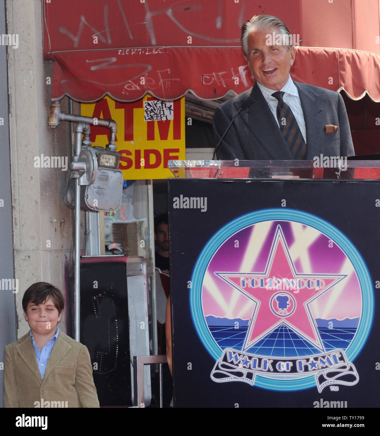 Actor George Hamilton speaks with fans after accepting his star on the ...