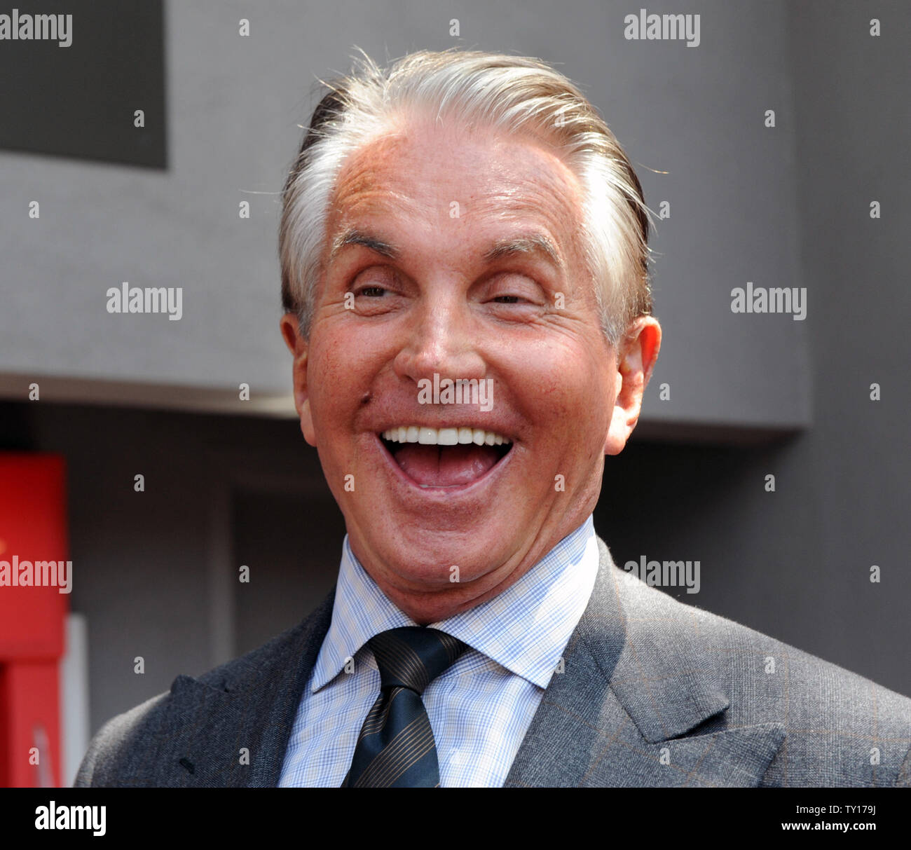 Actor George Hamilton saviors the moment after accepting a star on the ...