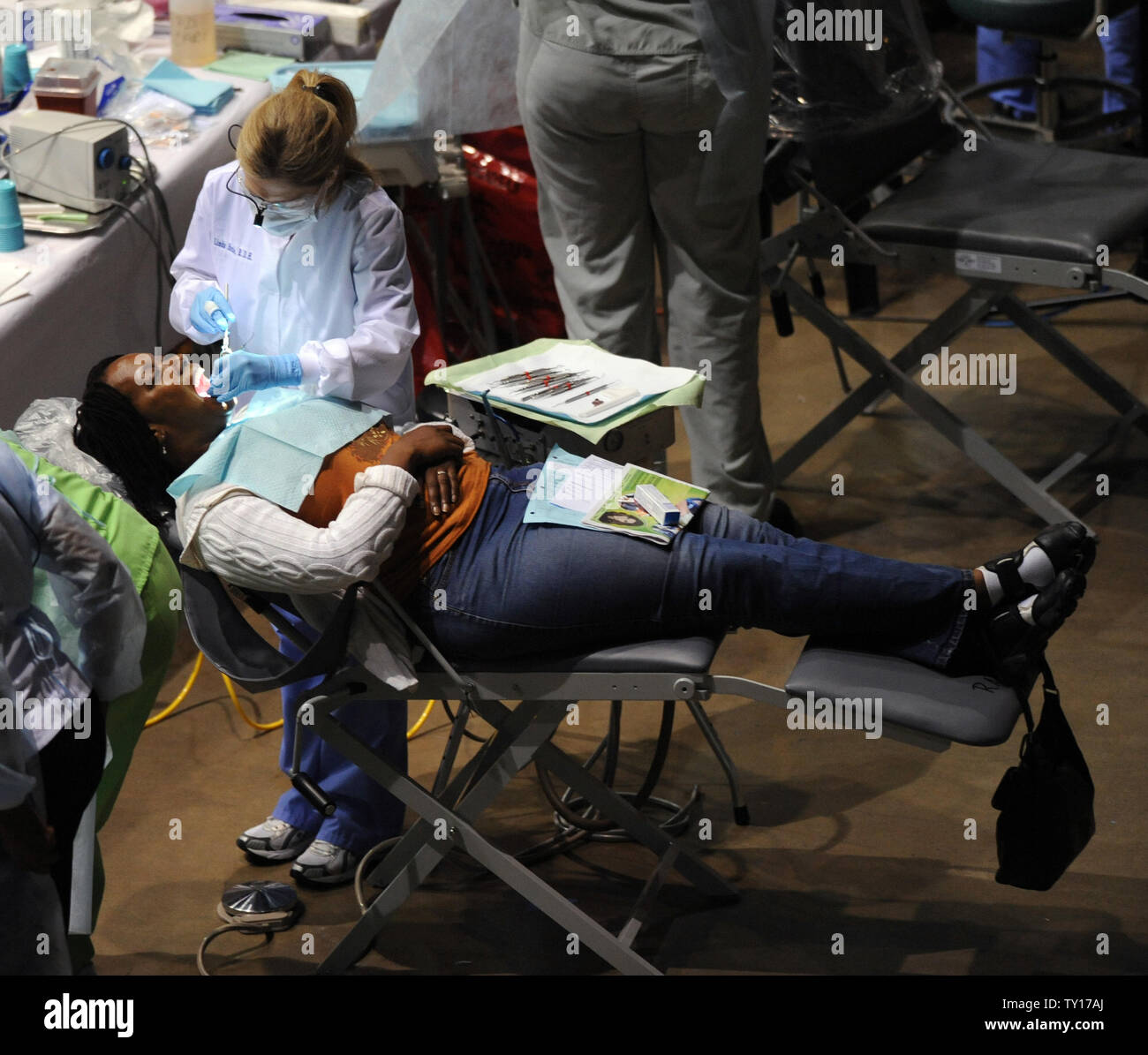 Patients receive free dental care hi-res stock photography and images ...