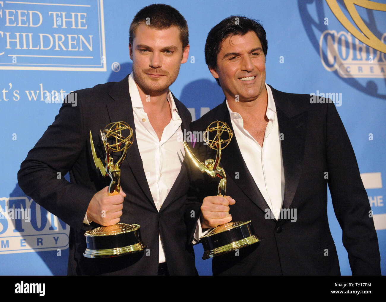 Vincent Irizarry (L) and Jeff Branson pose for photographers with the ...