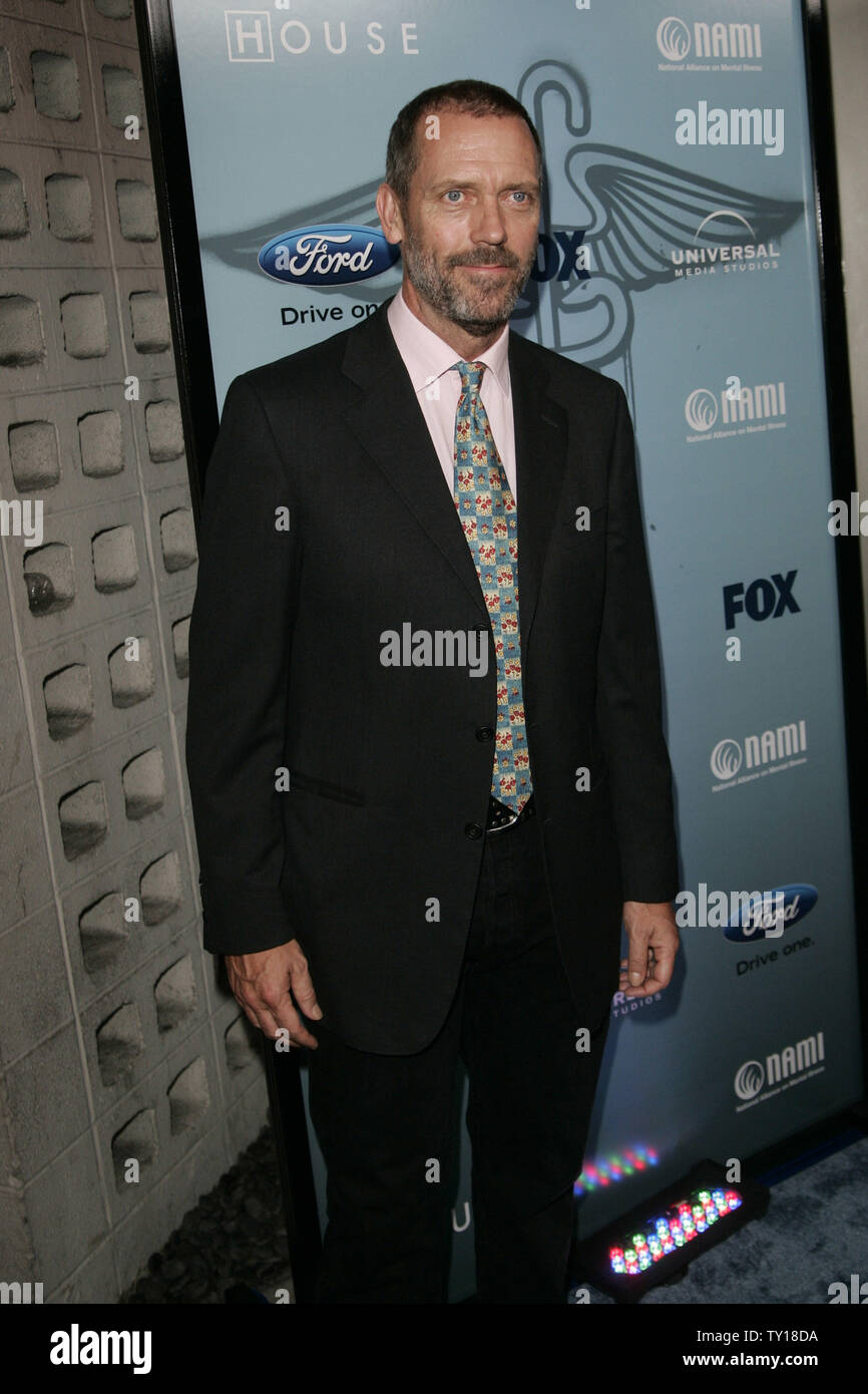 Actor Hugh Laurie arrives at the Season Six premiere for House at the ...
