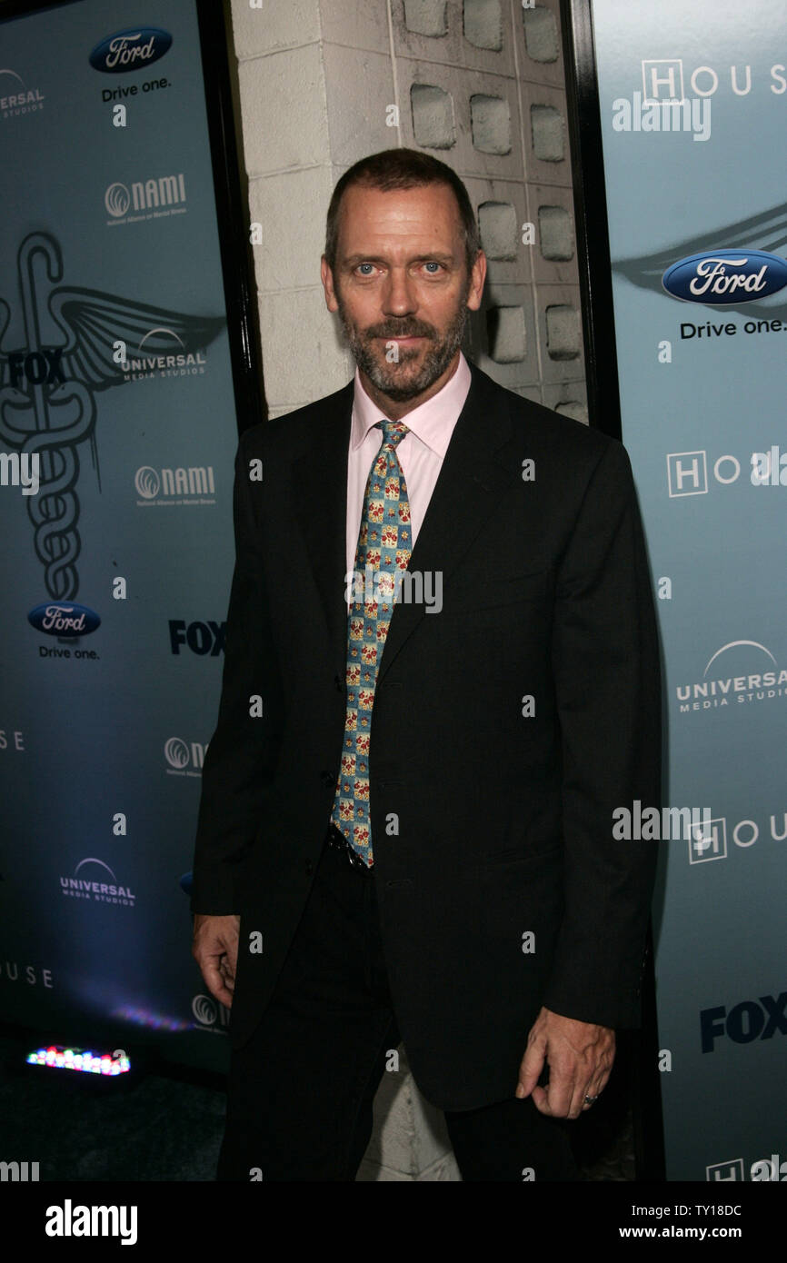 Actor Hugh Laurie arrives at the Season Six premiere for House at the ...