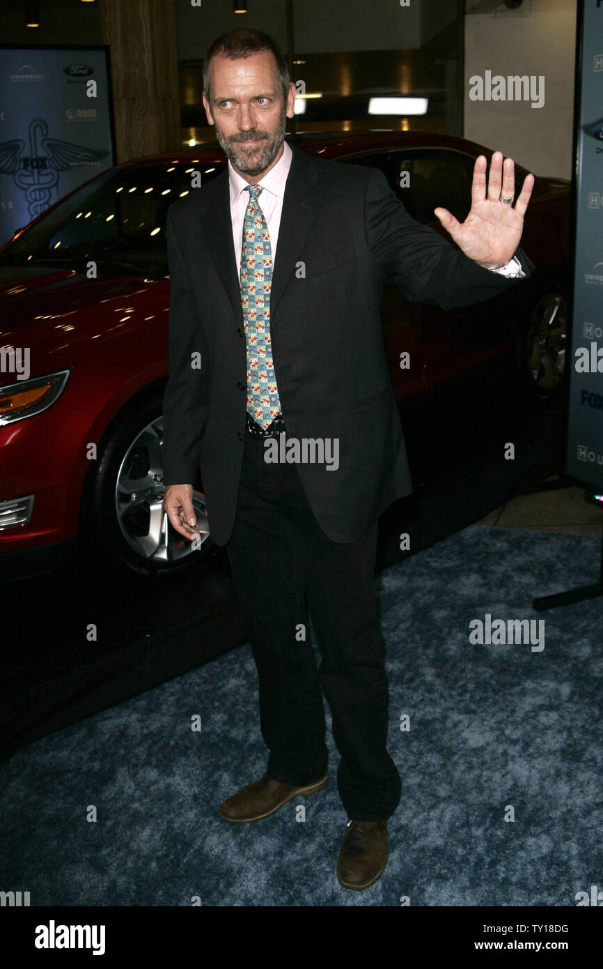 Actor Hugh Laurie arrives at the Season Six premiere for House at the ...