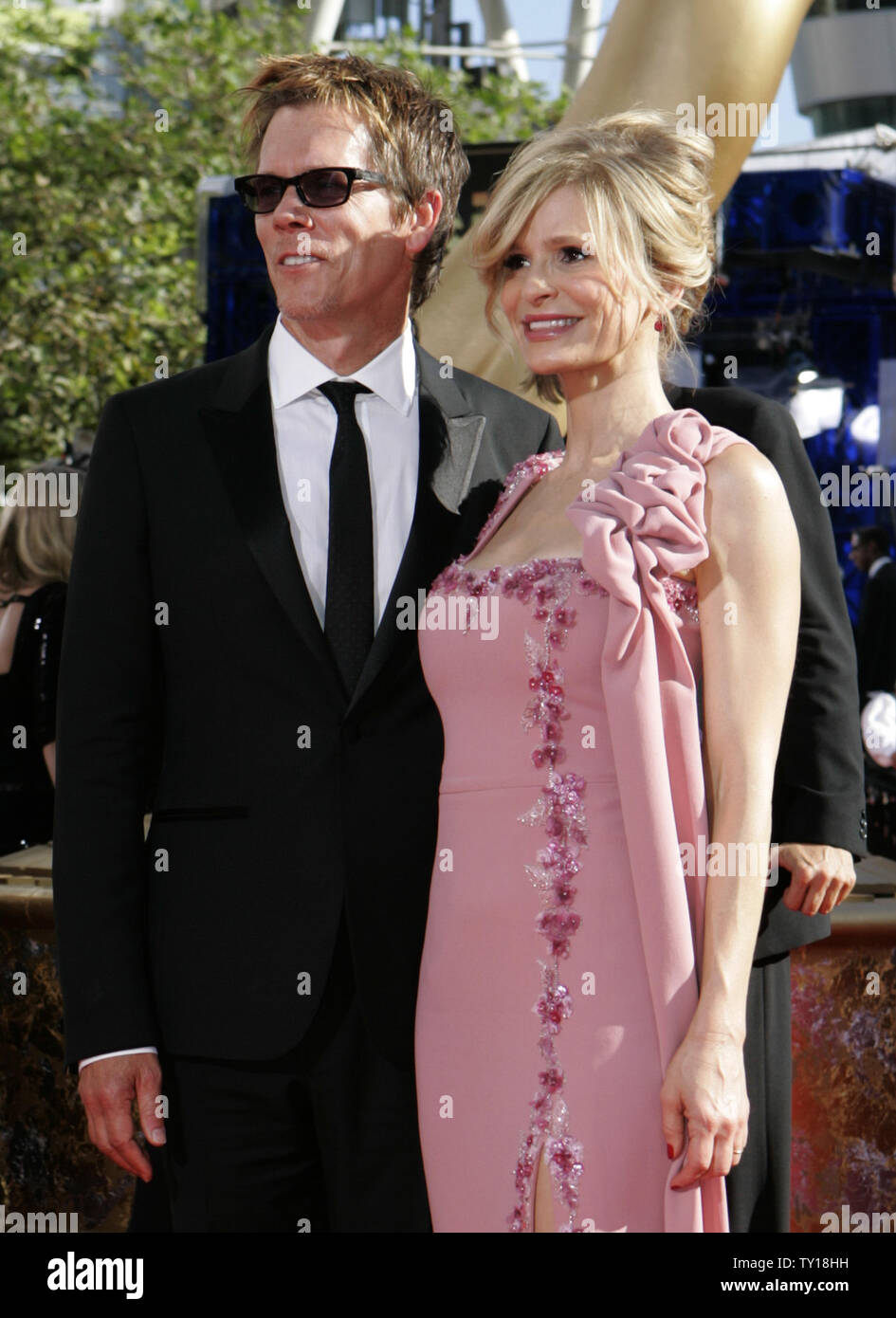 Kevin Bacon and Kyra Sedgwick arrive at the 61st Primetime Emmy Awards at the Nokia Center in ...