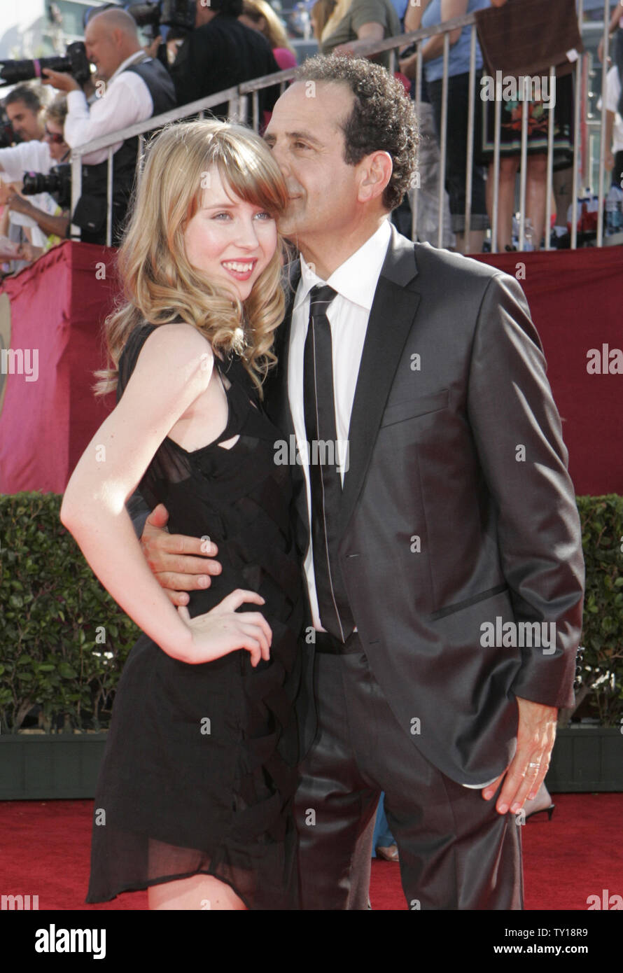 Tony Shalhoub kisses his daughter at the 61st Primetime Emmy Awards at the Nokia Center in Los ...