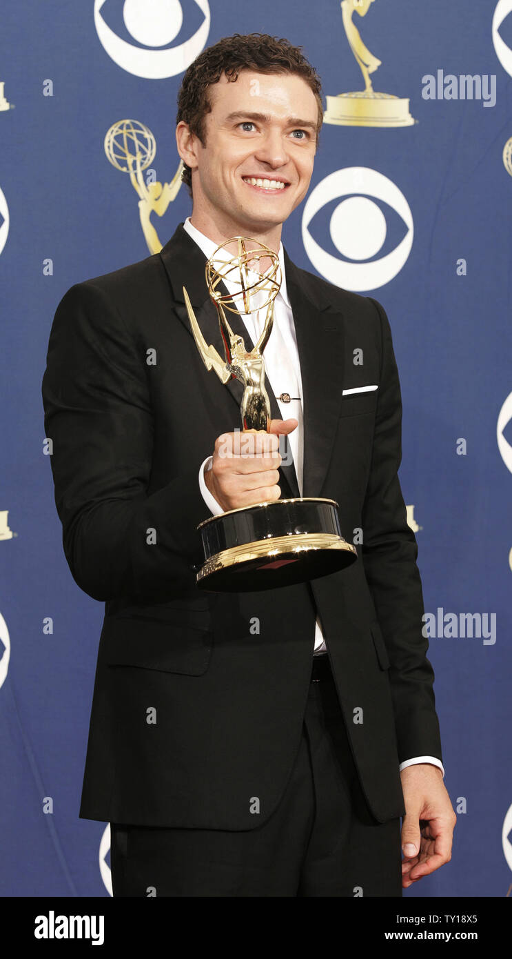 Justin Timberlake holds his trophy at the 61st Emmy Awards in Los ...