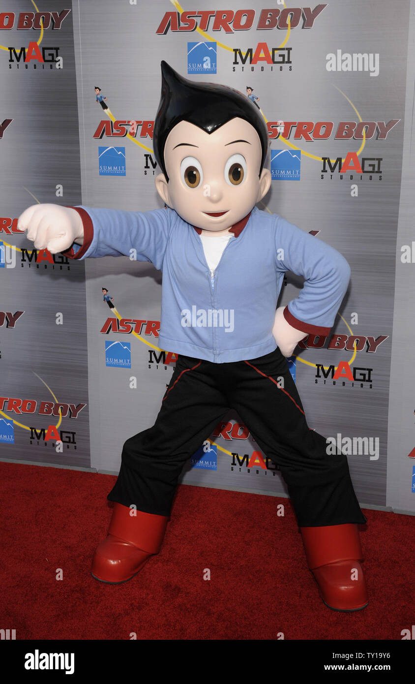 A performer in the costume of Astro Boy attends the premiere of the ...