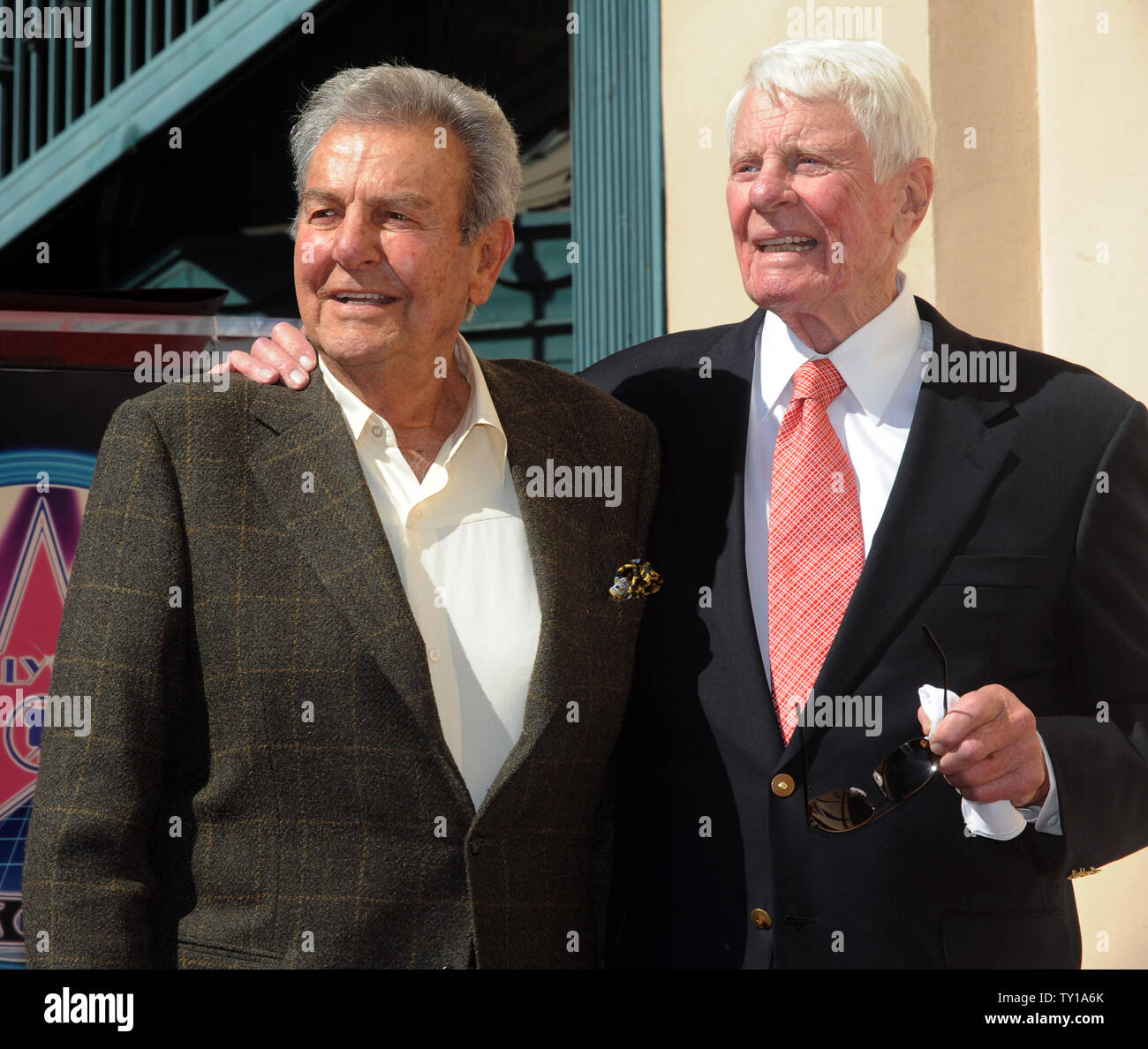 Actor Peter Graves (R) is joined by actor Mike Connors during ...