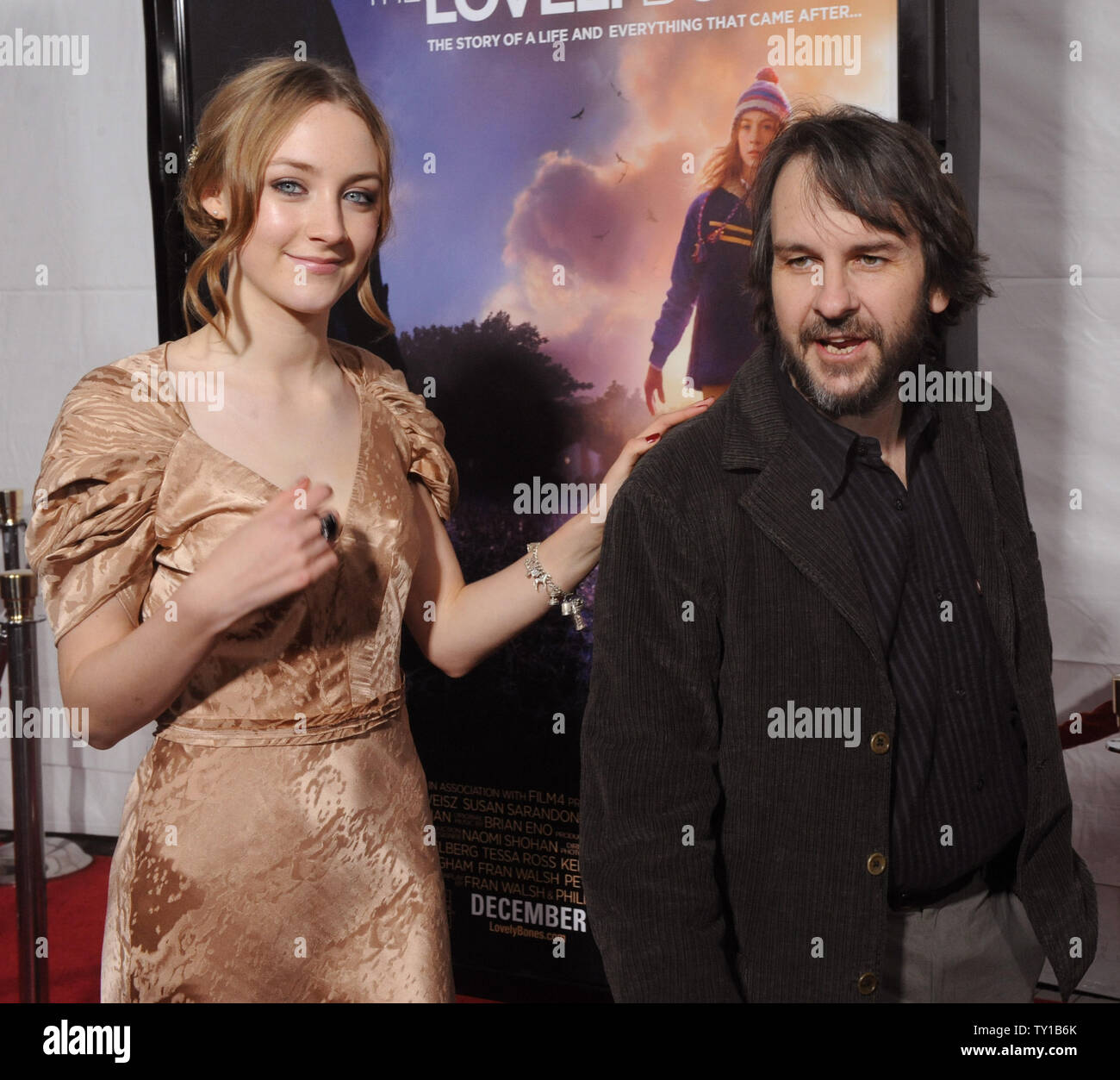 New Zealand director Peter Jackson and cast member Saoirse Ronan arrive ...