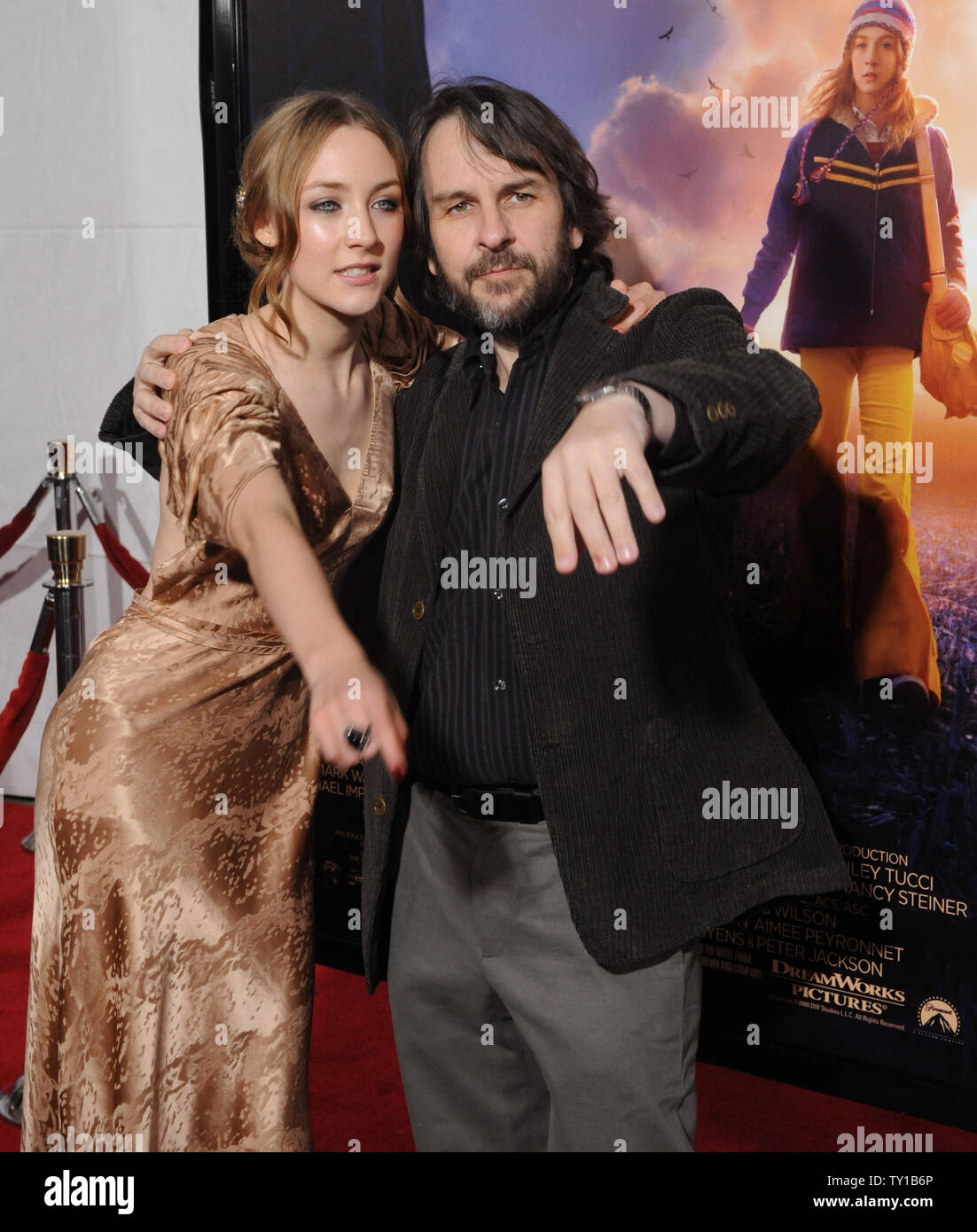 New Zealand director Peter Jackson and cast member Saoirse Ronan arrive ...