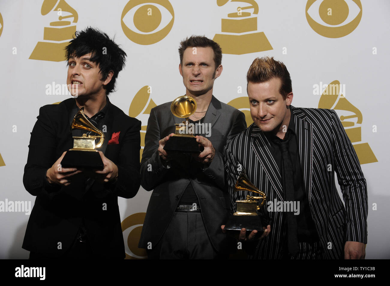 Green Day members Billie Joe Armstrong (L), Mike Dirnt (C) and Tre Cool ...