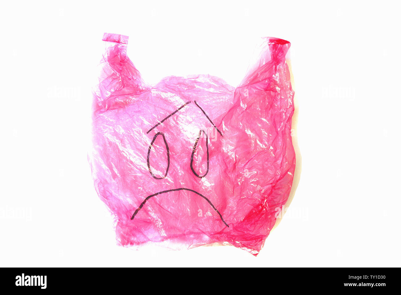 Plastic bag with sad emotion on face isolated against white background ...