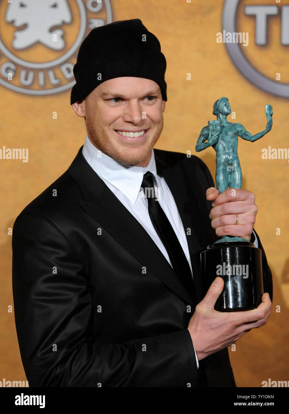 Actor Michael C. Hall appears backstage with his award for best actor ...