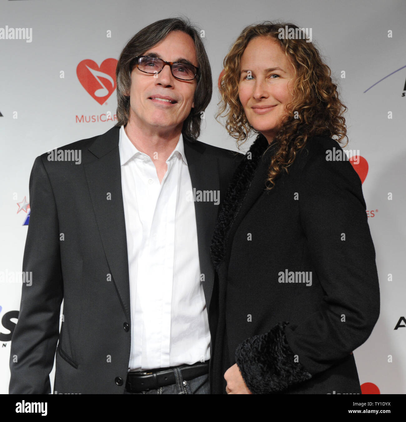 Musician Jackson Browne and Dianna Cohen attend the 2010 MusiCares ...