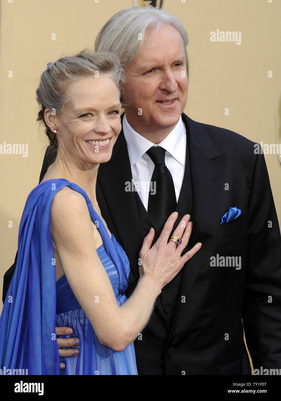James Cameron, director of "Avatar", and his wife Suzy Amis, arrive on ...