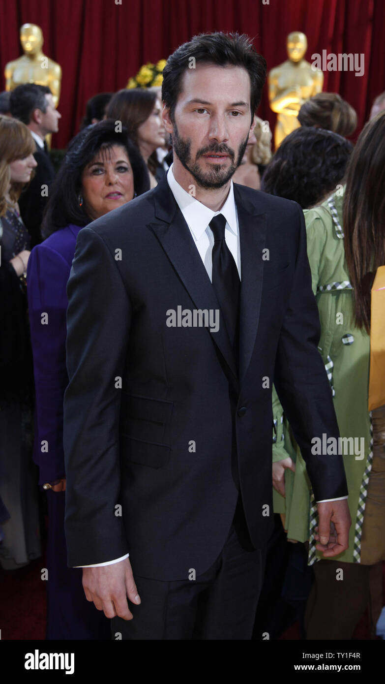 Actor Keanu Reeves arrives on the red carpet at the 82nd Academy Awards ...
