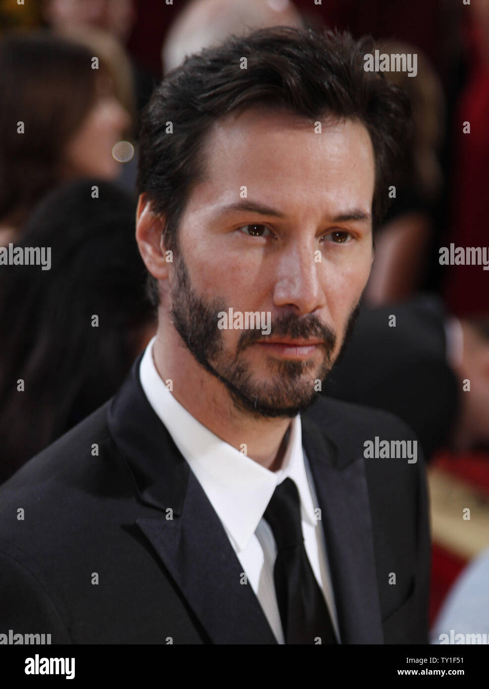Actor Keanu Reeves arrives on the red carpet at the 82nd Academy Awards ...